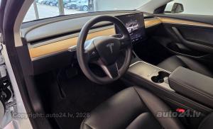 White Tesla Model 3 2022 in Tartu, with an engine capacity of 0.00 L and mileage of 125 thousand km for 29990 €, photo 6 on AUTOMOTO.COM.LV