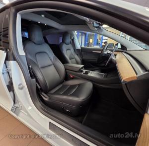 White Tesla Model 3 2022 in Tartu, with an engine capacity of 0.00 L and mileage of 125 thousand km for 29990 €, photo 9 on AUTOMOTO.COM.LV