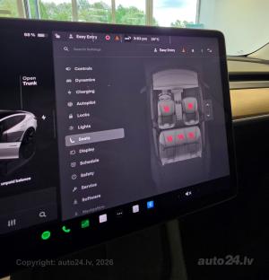 White Tesla Model 3 2022 in Tartu, with an engine capacity of 0.00 L and mileage of 125 thousand km for 29990 €, photo 13 on AUTOMOTO.COM.LV
