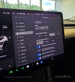 White Tesla Model 3 2022 in Tartu, with an engine capacity of 0.00 L and mileage of 125 thousand km for 29990 €, photo 14 on AUTOMOTO.COM.LV