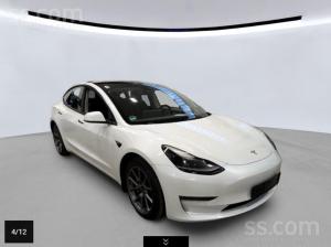 White Tesla Model 3 2022 in Riga, with an engine capacity of 0.00 L and mileage of 137 thousand km for 26650 €, photo 4 on AUTOMOTO.COM.LV