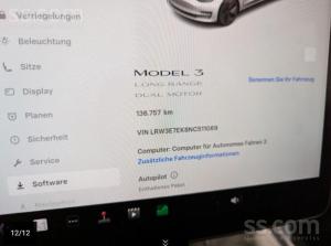 White Tesla Model 3 2022 in Riga, with an engine capacity of 0.00 L and mileage of 137 thousand km for 26650 €, photo 8 on AUTOMOTO.COM.LV