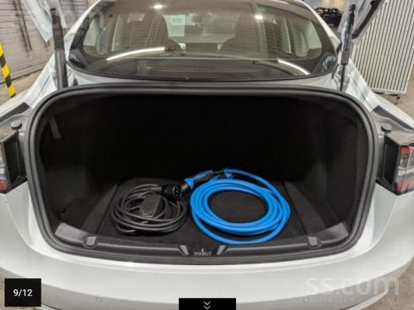White Tesla Model 3 2022 in Riga, with an engine capacity of 0.00 L and mileage of 137 thousand km for 26650 €, photo 9 on AUTOMOTO.COM.LV