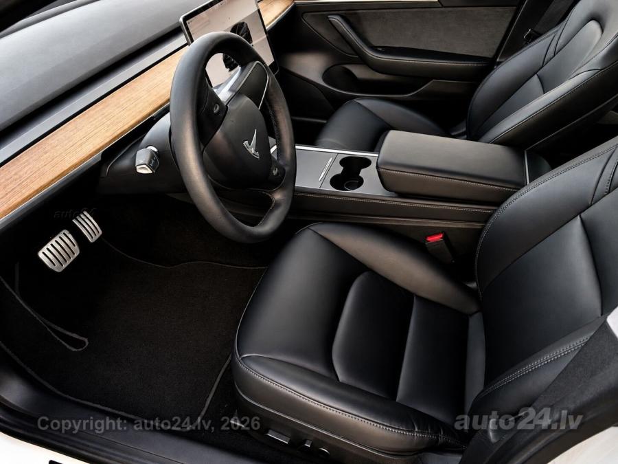 White Tesla Model 3 2023 in Parnu, with an engine capacity of 0.00 L and mileage of 50 thousand km for 37600 €, photo 7 on AUTOMOTO.COM.LV