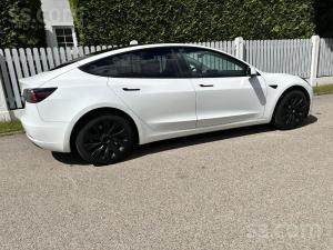 White Tesla Model 3 2023 in Jurmala, with an engine capacity of 0.00 L and mileage of 37 thousand km for 30500 €, photo 6 on AUTOMOTO.COM.LV