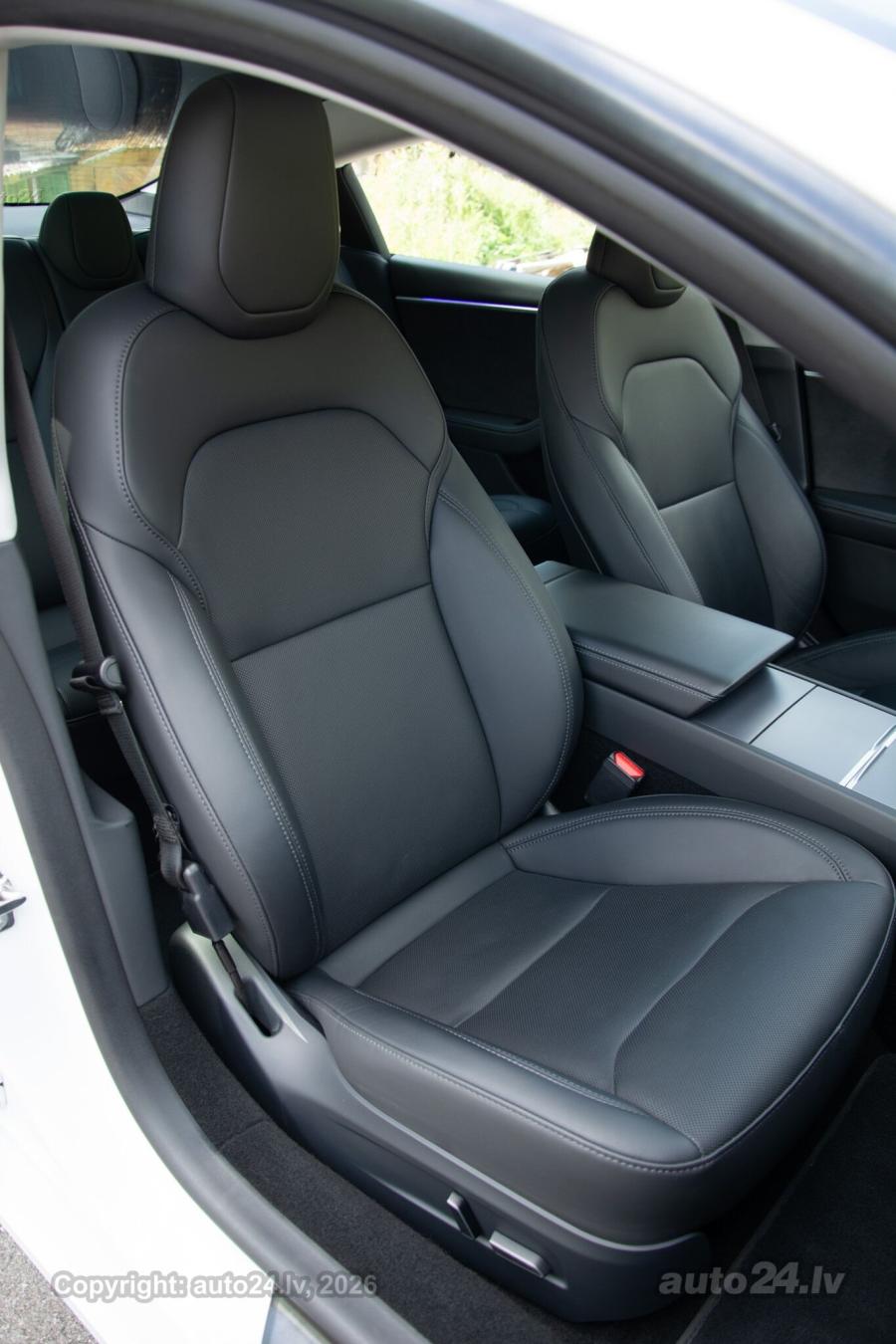 White Tesla Model 3 2023 in Parnu, with an engine capacity of 0.00 L and mileage of 82 thousand km for 35990 €, photo 12 on AUTOMOTO.COM.LV