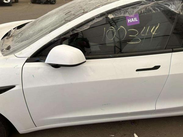 White Tesla Model 3 2023 in Kaunas, with an engine capacity of 0.00 L and mileage of 92 thousand km for 22500 €, photo 10 on AUTOMOTO.COM.LV
