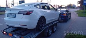Balts Tesla Model 3 2023 Ventspils, ar dzinēja tilpumu 0.00 L un nobraukumu 88 tūkst. km par 22000 €, foto 25 vietnē AUTOMOTO.COM.LV