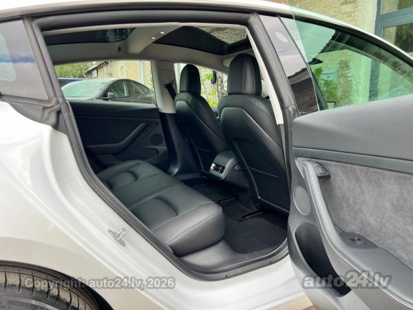 White Tesla Model 3 2023 in Tallinn, with an engine capacity of 0.00 L and mileage of 38 thousand km for 34990 €, photo 8 on AUTOMOTO.COM.LV