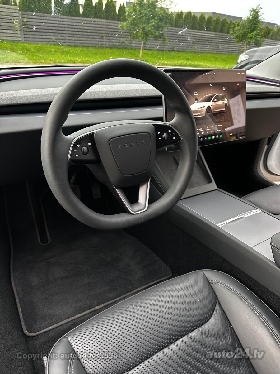 White Tesla Model 3 2023 in Tallinn, with an engine capacity of 0.00 L and mileage of 45 thousand km for 37999 €, photo 7 on AUTOMOTO.COM.LV