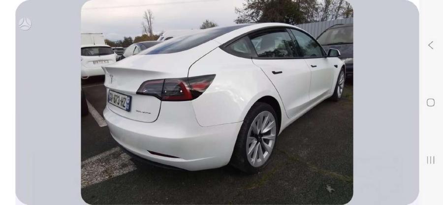 White Tesla Model 3 2024 in Kaunas, with an engine capacity of 0.00 L and mileage of 30 thousand km for 16400 €, photo 5 on AUTOMOTO.COM.LV
