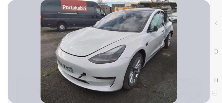 White Tesla Model 3 2024 in Kaunas, with an engine capacity of 0.00 L and mileage of 30 thousand km for 16400 €, photo 6 on AUTOMOTO.COM.LV