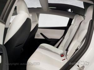 White Tesla Model 3 2024 in Tallinn, with an engine capacity of 0.00 L and mileage of 27 thousand km for 44990 €, photo 6 on AUTOMOTO.COM.LV