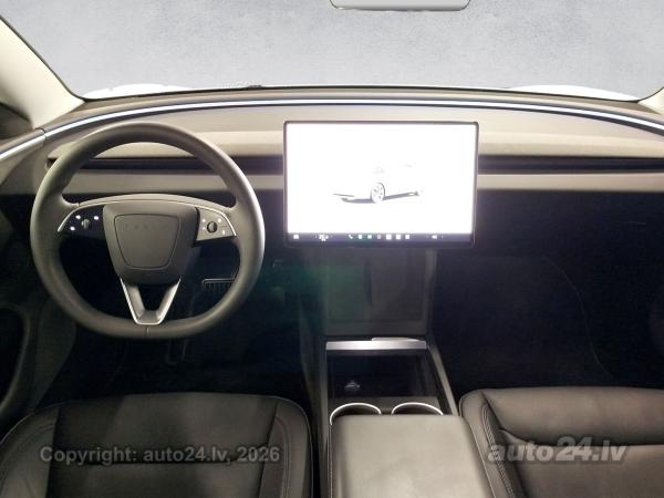 White Tesla Model 3 2024 in Tallinn, with an engine capacity of 0.00 L and mileage of 62 thousand km for 42990 €, photo 5 on AUTOMOTO.COM.LV