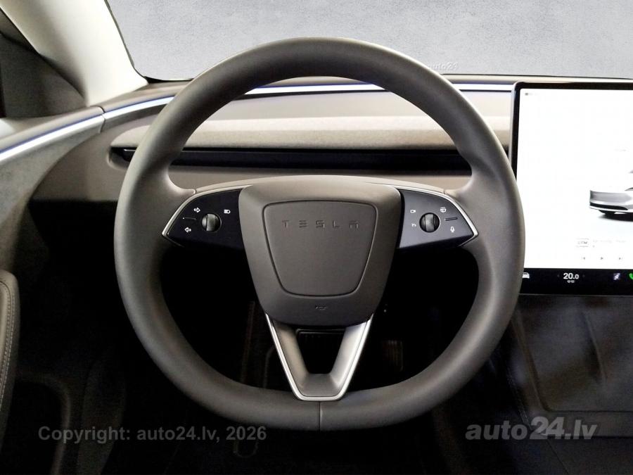 White Tesla Model 3 2024 in Tallinn, with an engine capacity of 0.00 L and mileage of 30 thousand km for 45990 €, photo 5 on AUTOMOTO.COM.LV