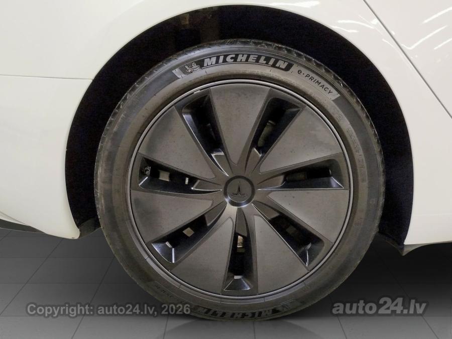 White Tesla Model 3 2024 in Tallinn, with an engine capacity of 0.00 L and mileage of 30 thousand km for 45990 €, photo 10 on AUTOMOTO.COM.LV