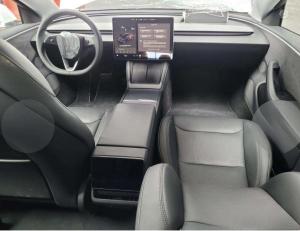 White Tesla Model 3 2024 in Kaunas, with an engine capacity of 0.00 L and mileage of 40 thousand km for 25900 €, photo 11 on AUTOMOTO.COM.LV