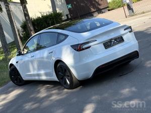 White Tesla Model 3 2024 in Jurmala, with an engine capacity of 0.00 L and mileage of 0 thousand km for 36950 €, photo 15 on AUTOMOTO.COM.LV