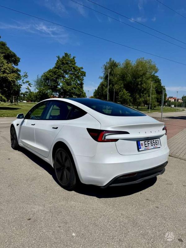 White Tesla Model 3 2024 in Klaipeda, with an engine capacity of 0.00 L and mileage of 37 thousand km for 29900 €, photo 5 on AUTOMOTO.COM.LV
