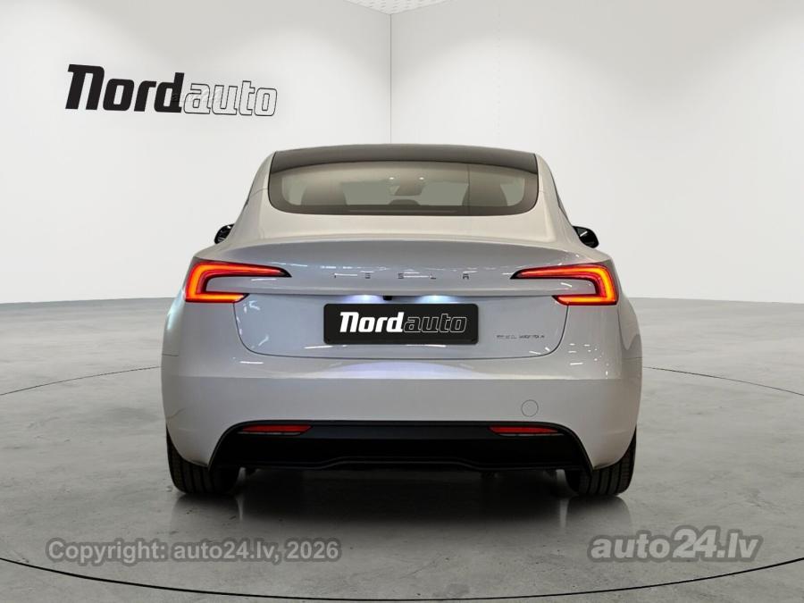 White Tesla Model 3 2024 in Tallinn, with an engine capacity of 0.00 L and mileage of 40 thousand km for 44900 €, photo 5 on AUTOMOTO.COM.LV