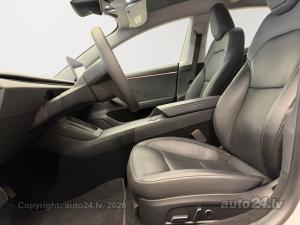 White Tesla Model 3 2024 in Tallinn, with an engine capacity of 0.00 L and mileage of 40 thousand km for 44900 €, photo 6 on AUTOMOTO.COM.LV