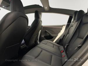 White Tesla Model 3 2024 in Tallinn, with an engine capacity of 0.00 L and mileage of 40 thousand km for 44900 €, photo 7 on AUTOMOTO.COM.LV