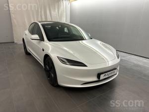 White Tesla Model 3 2024 in Riga, with an engine capacity of 0.00 L and mileage of 75 thousand km for 42000 €, photo 3 on AUTOMOTO.COM.LV