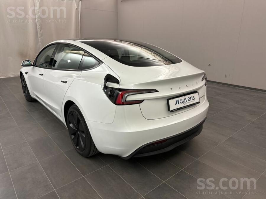 White Tesla Model 3 2024 in Riga, with an engine capacity of 0.00 L and mileage of 75 thousand km for 42000 €, photo 4 on AUTOMOTO.COM.LV