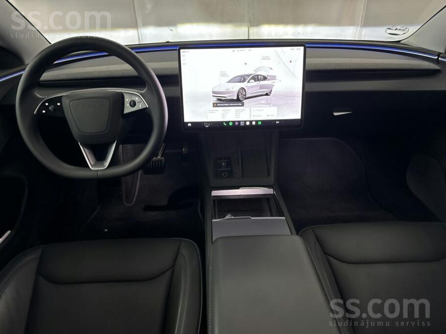White Tesla Model 3 2024 in Riga, with an engine capacity of 0.00 L and mileage of 75 thousand km for 42000 €, photo 7 on AUTOMOTO.COM.LV