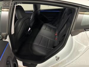 White Tesla Model 3 2024 in Riga, with an engine capacity of 0.00 L and mileage of 75 thousand km for 42000 €, photo 8 on AUTOMOTO.COM.LV