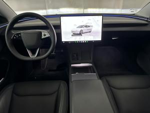 White Tesla Model 3 2024 in Riga, with an engine capacity of 0.00 L and mileage of 75 thousand km for 42000 €, photo 6 on AUTOMOTO.COM.LV