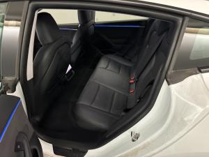 White Tesla Model 3 2024 in Riga, with an engine capacity of 0.00 L and mileage of 75 thousand km for 42000 €, photo 7 on AUTOMOTO.COM.LV