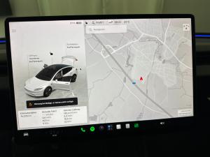 White Tesla Model 3 2024 in Riga, with an engine capacity of 0.00 L and mileage of 75 thousand km for 42000 €, photo 9 on AUTOMOTO.COM.LV