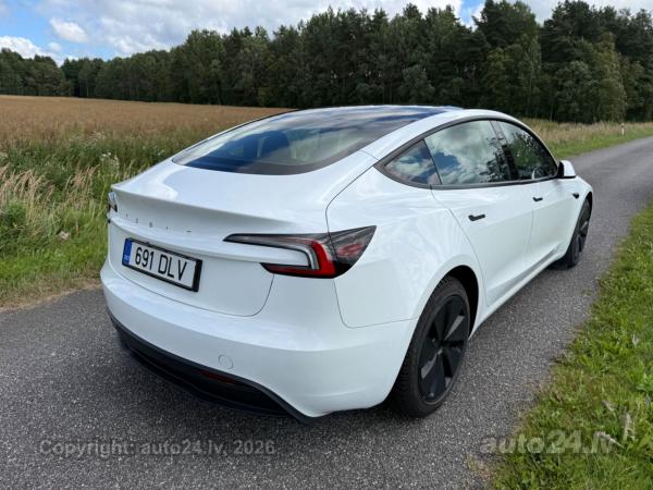 White Tesla Model 3 2024 in Tallinn, with an engine capacity of 0.00 L and mileage of 38 thousand km for 36700 €, photo 6 on AUTOMOTO.COM.LV
