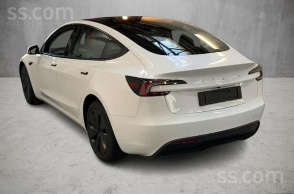 White Tesla Model 3 2024 in Riga, with an engine capacity of 0.00 L and mileage of 27 thousand km for 37900 €, photo 4 on AUTOMOTO.COM.LV