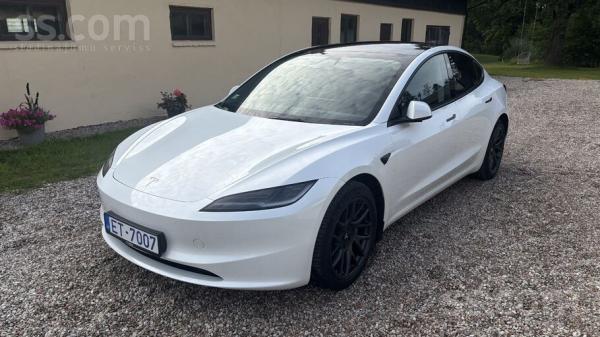 White Tesla Model 3 2024 in Riga, with an engine capacity of 0.00 L and mileage of 70 thousand km for 35200 €, photo 2 on AUTOMOTO.COM.LV