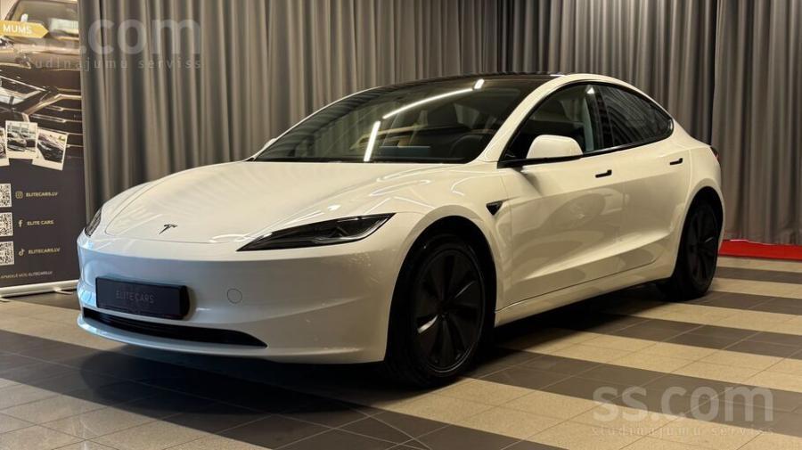 White Tesla Model 3 2024 in Riga, with an engine capacity of 0.00 L and mileage of 75 thousand km for 42000 €, photo 1 on AUTOMOTO.COM.LV