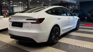 White Tesla Model 3 2024 in Riga, with an engine capacity of 0.00 L and mileage of 75 thousand km for 42000 €, photo 3 on AUTOMOTO.COM.LV
