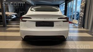 White Tesla Model 3 2024 in Riga, with an engine capacity of 0.00 L and mileage of 75 thousand km for 42000 €, photo 5 on AUTOMOTO.COM.LV