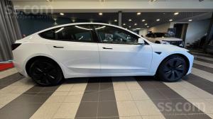 White Tesla Model 3 2024 in Riga, with an engine capacity of 0.00 L and mileage of 75 thousand km for 42000 €, photo 8 on AUTOMOTO.COM.LV