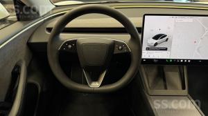 White Tesla Model 3 2024 in Riga, with an engine capacity of 0.00 L and mileage of 75 thousand km for 42000 €, photo 12 on AUTOMOTO.COM.LV