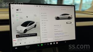 White Tesla Model 3 2024 in Riga, with an engine capacity of 0.00 L and mileage of 75 thousand km for 40990 €, photo 14 on AUTOMOTO.COM.LV