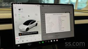 White Tesla Model 3 2024 in Riga, with an engine capacity of 0.00 L and mileage of 75 thousand km for 40990 €, photo 15 on AUTOMOTO.COM.LV