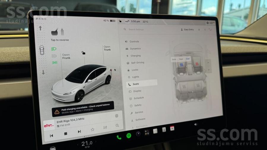 White Tesla Model 3 2024 in Riga, with an engine capacity of 0.00 L and mileage of 75 thousand km for 40990 €, photo 16 on AUTOMOTO.COM.LV