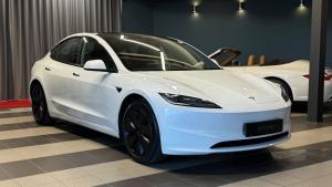 White Tesla Model 3 2024 in Riga, with an engine capacity of 0.00 L and mileage of 75 thousand km for 42000 €, photo 5 on AUTOMOTO.COM.LV