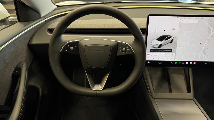 White Tesla Model 3 2024 in Riga, with an engine capacity of 0.00 L and mileage of 75 thousand km for 42000 €, photo 11 on AUTOMOTO.COM.LV