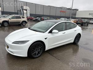 White Tesla Model 3 2024 in Riga, with an engine capacity of 0.00 L and mileage of 50 thousand km for 23000 €, photo 4 on AUTOMOTO.COM.LV