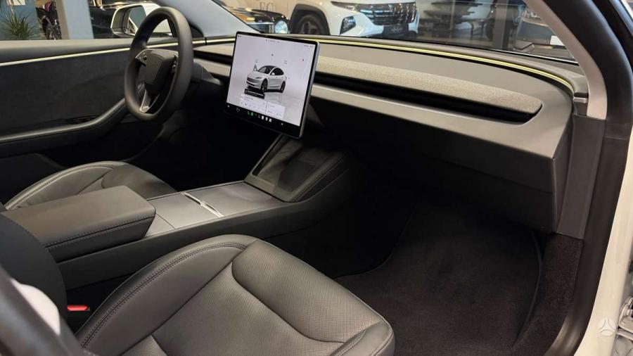Balts Tesla Model 3 2024 Rīga, ar dzinēja tilpumu 0.00 L un nobraukumu 75 tūkst. km par 42000 €, foto 13 vietnē AUTOMOTO.COM.LV