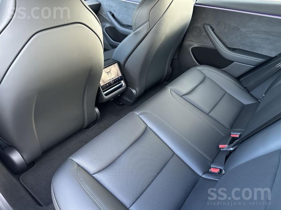 White Tesla Model 3 2025 in Riga, with an engine capacity of 0.00 L and mileage of 10 thousand km for 66720 €, photo 14 on AUTOMOTO.COM.LV
