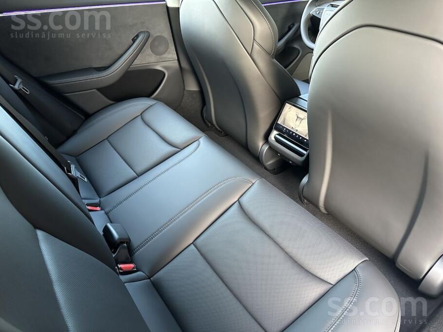 White Tesla Model 3 2025 in Riga, with an engine capacity of 0.00 L and mileage of 10 thousand km for 66720 €, photo 15 on AUTOMOTO.COM.LV